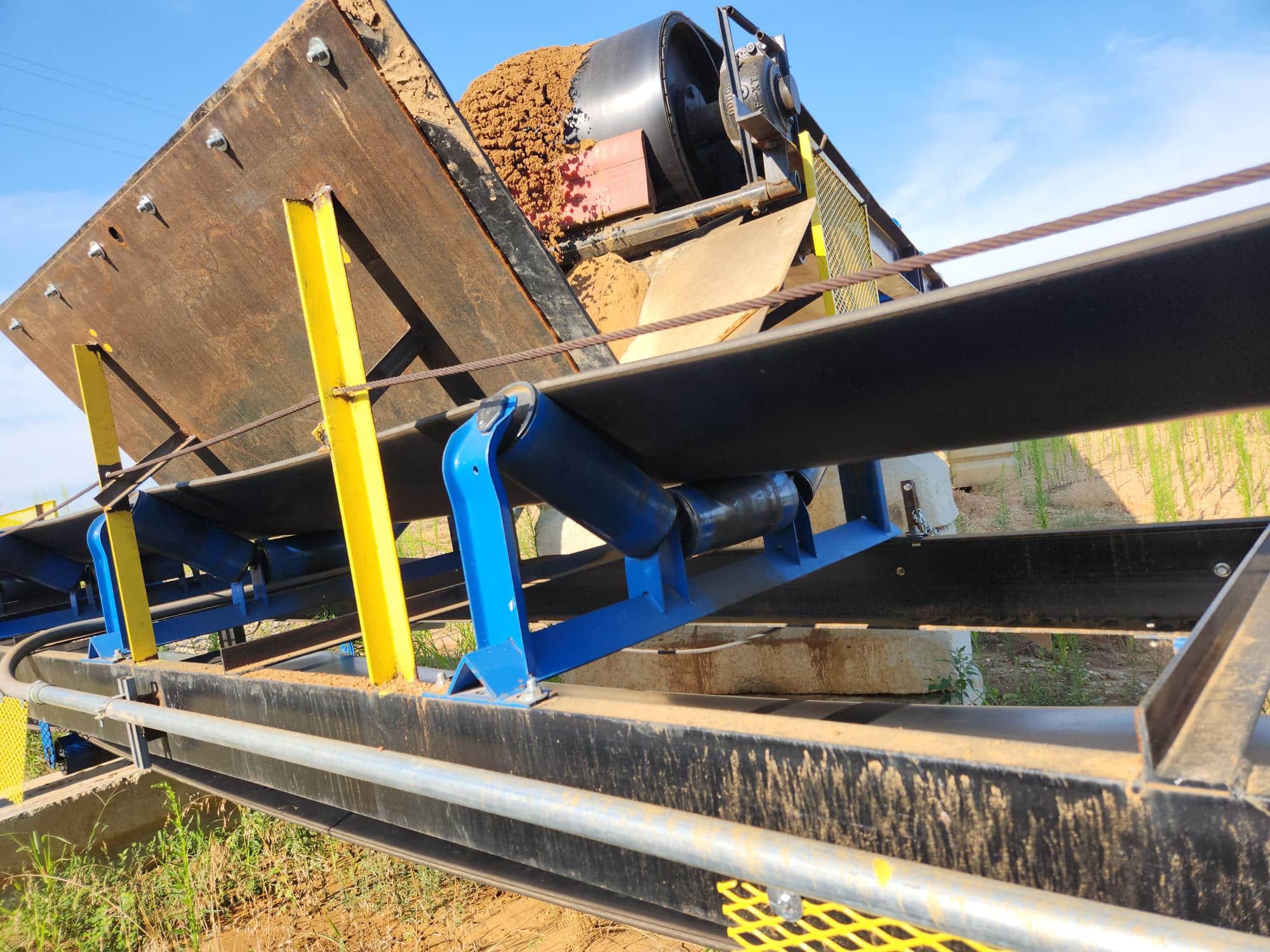 Outside Conveyor with Moisture Issues - Divine Industrial Sales